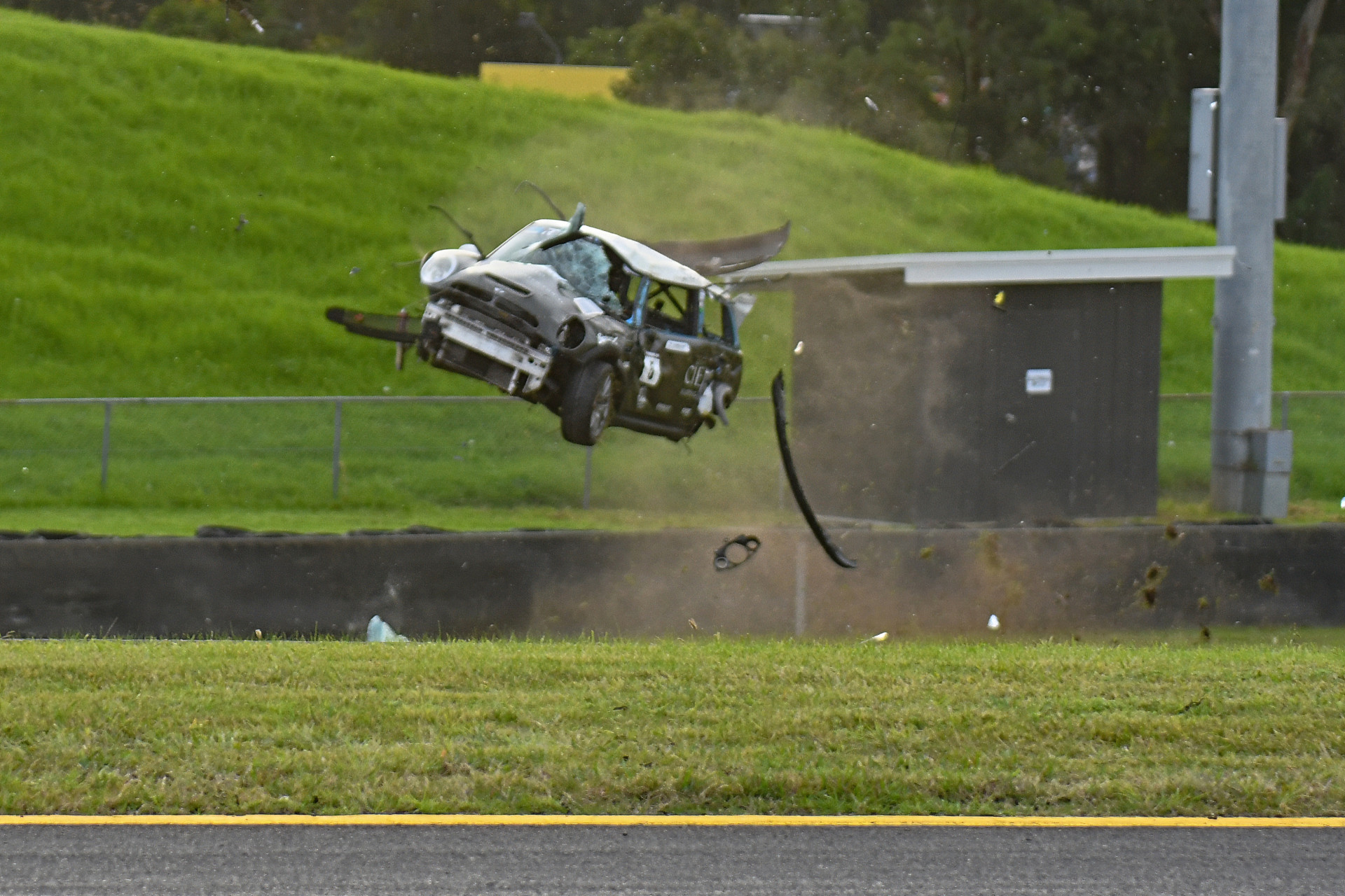 Mini racer survives sickening Sydney Motorsport Park rollover ...